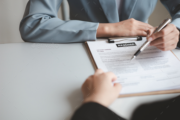 Person submitting resume to interview for a job with a company, Person ...