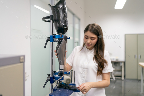 Prosthetics Laboratory, Prosthetics Technician Checking Prosthetic Leg ...