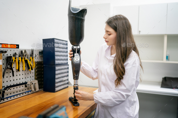 Prosthetics Laboratory, Prosthetics Technician Checking Prosthetic Leg ...