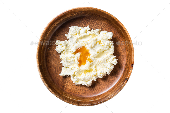 Tradirional Turkish cuisine - kaymak clotted cream and honey. Isolated ...