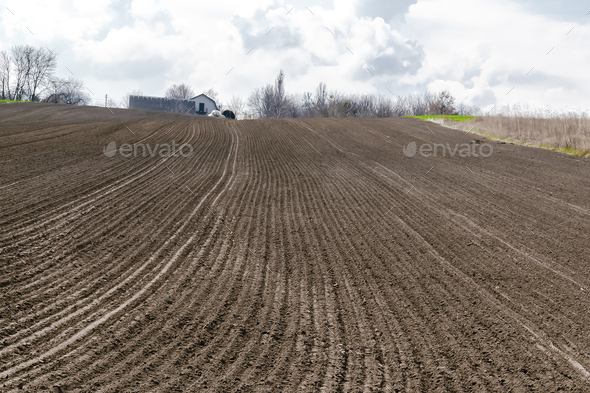 Plowed ground agricultural field for seed sowing,planting process ...