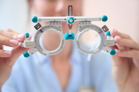Detail photo of ophthalmology trial frame in front of the doctor Stock ...