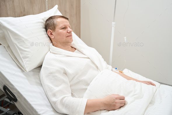 Adorable male is resting after the health procedure in the medical ...