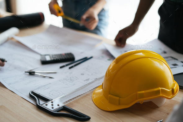 Engineer and Developers Gathered Around Finding Solution and Analysing ...