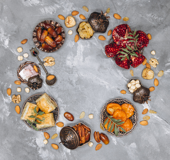 Ramadan composition of traditional Islamic dishes, dried fruits, fresh ...