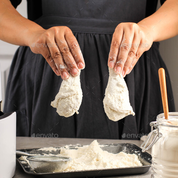 Female Home Chef Making Homemade Crispy Fried Chicken, Coating Chicken ...