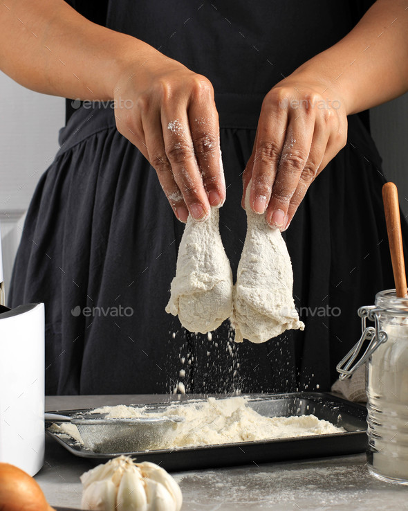 Female Home Chef Making Homemade Crispy Fried Chicken, Coating Chicken ...