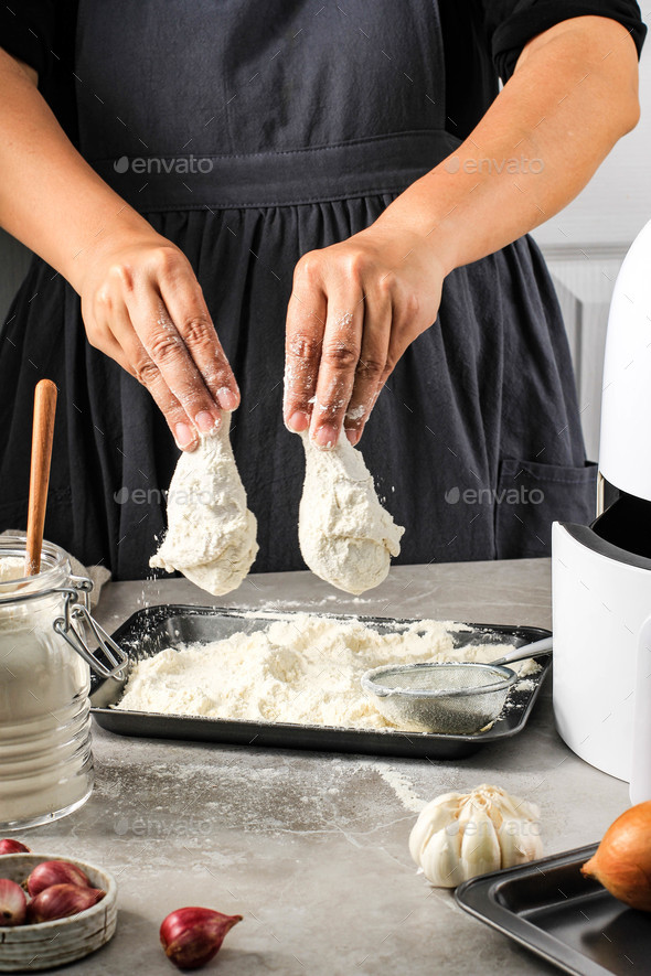 Female Home Chef Making Homemade Crispy Fried Chicken, Coating Chicken ...