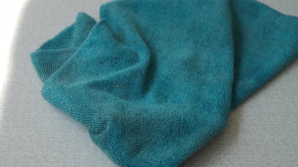 Dirty Microfiber Cloth is Lying on Table After Cleaning, Stock Footage