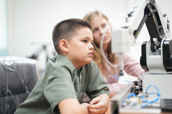 Children learning AI technology Robot with artificial intelligence ...