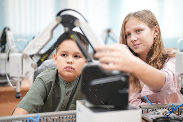 Children learning AI technology Robot with artificial intelligence ...