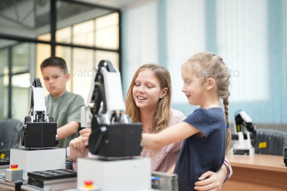 Children learning AI technology Robot with artificial intelligence ...