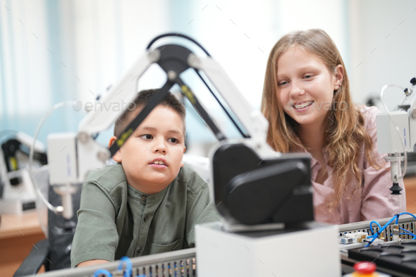 Children learning AI technology Robot with artificial intelligence ...