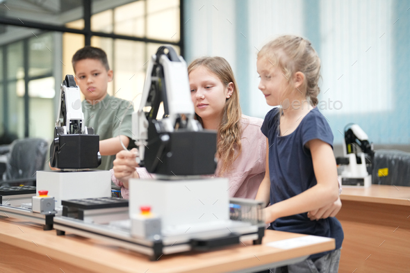 Children learning AI technology Robot with artificial intelligence ...