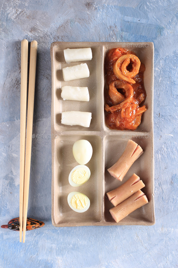 Topokki or Tteokbokki is Stir-fried Rice Cake with Vegetables and Fish ...