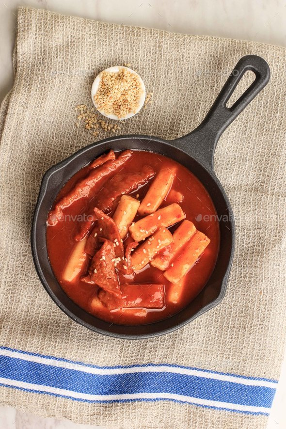 Topokki or Tteokbokki is Stir-fried Rice Cake with Vegetables and Fish ...