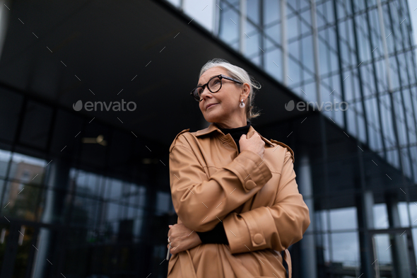 horizontal photo of caucasian mature adult female accountant with gray ...