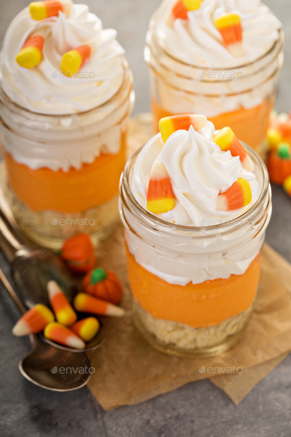 Layered candy corn dessert in jars Stock Photo by fahrwasser | PhotoDune