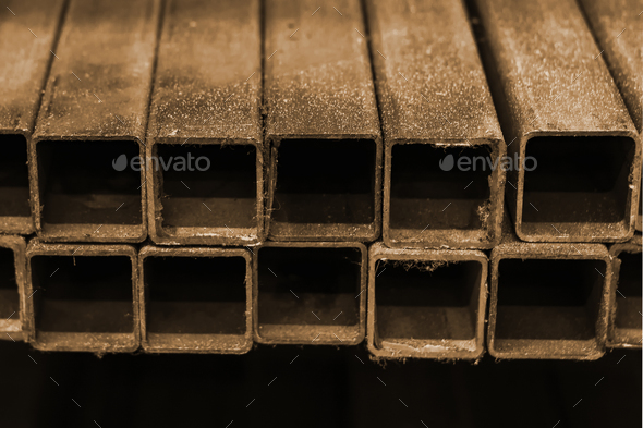 Square iron pipes. Side view, indoors horizontal shot. Stock Photo by ...