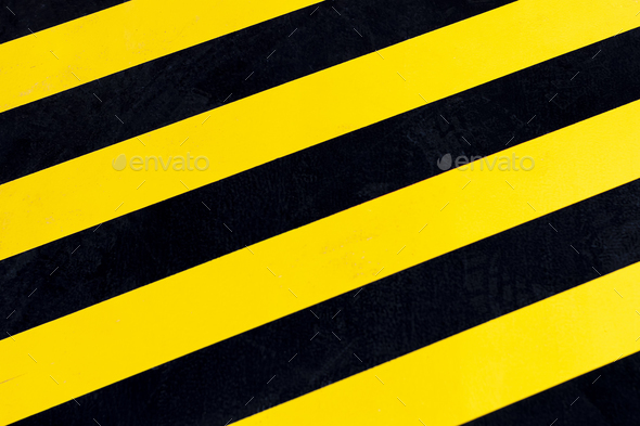 Yellow and black stripes on the floor of the warehouse. Top view ...