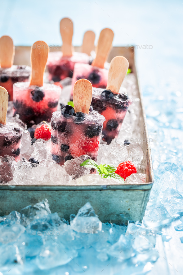 Delicious and homemade berry fruits ice cream on a stick. Stock Photo ...