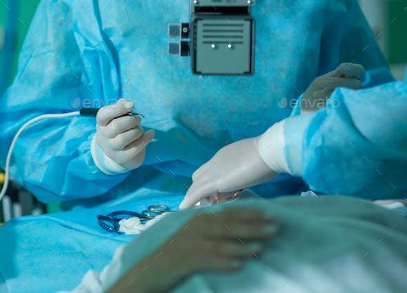 ophthalmologist performs an operation on the patient's eye. Stock Photo ...