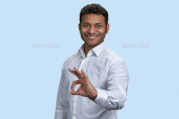 Portrait of an indian young man shows the OK gesture sign. Stock Photo ...