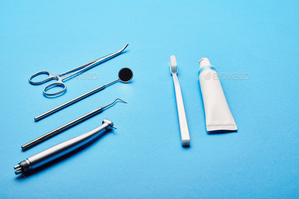 close up view of arrangement of sterile dental instruments, stethoscope ...