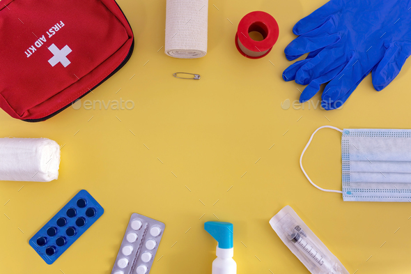 first aid kit - bandages, band-aid, tablets, medical gloves, face mask ...