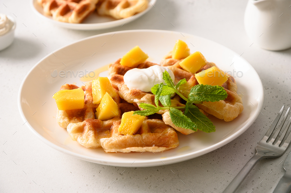 Popular croffles with maple syrup and whipped cream for delicious ...