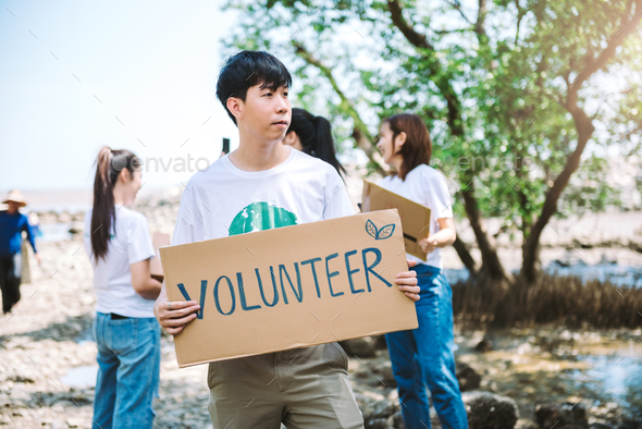 Group of diverse people volunteer teamwork holding campaign signs in ...