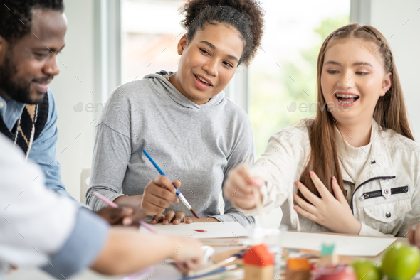 Diversity group of students drawing and painting in Arts class Stock ...