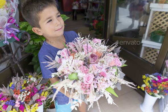 child gives flowers with roses. For a project for Mother's Day, and ...
