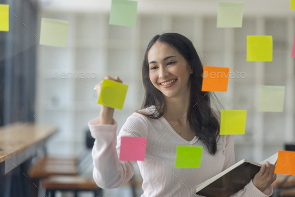 Business female employee with many conflicting priorities arranging ...