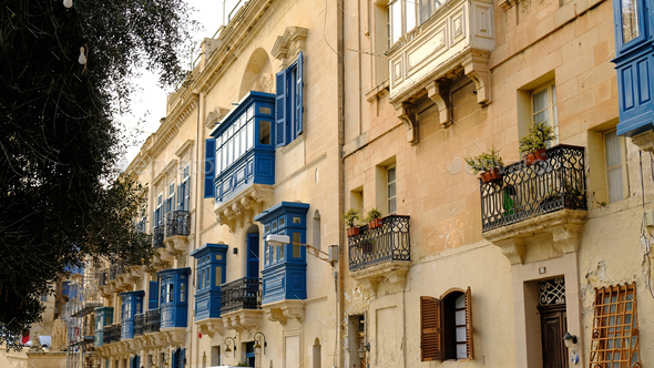 Typical residential houses in the cities in Malta, multiple floors and ...