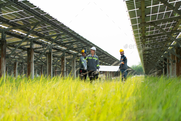 Engineering and technicians unloading repaired solar panels Stock Photo ...