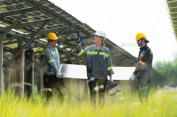 Engineering and technicians unloading repaired solar panels Stock Photo ...
