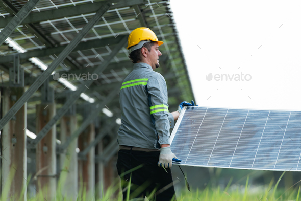 Engineering and technician unloading repaired solar panels Stock Photo ...