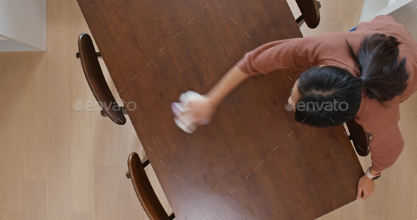 Top view of woman clean the table Stock Photo by leungchopan | PhotoDune