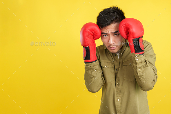 Chinese man in boxing guard position wearing boxing gloves Stock Photo ...