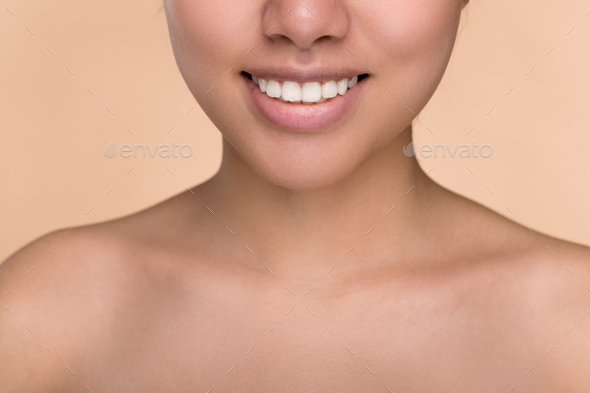 Half face of Asian girl. Chinese young woman with perfect skin ...