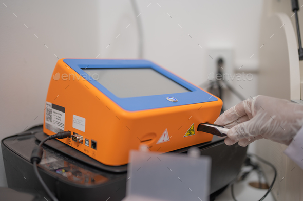 Laboratory technician entering a biological test into the immunology ...