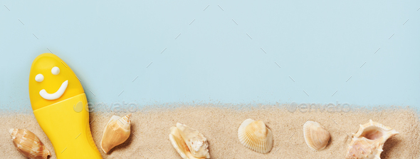 Yellow tube with happy sunscreen face. Sun Ultraviolet protection ...