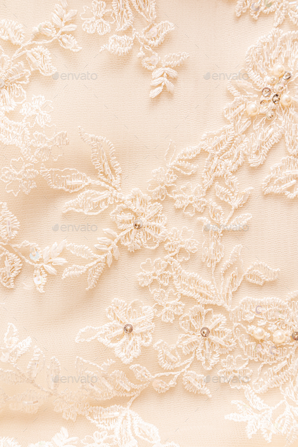 Beautiful beige background with embroidered colors and bisser. gentle ...