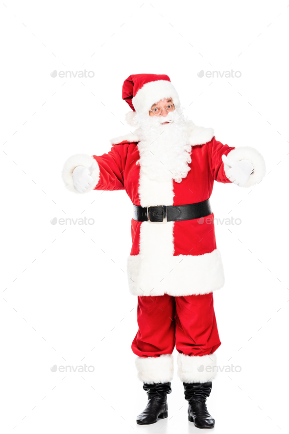 santa claus looking at camera and showing thumbs up isolated on white ...