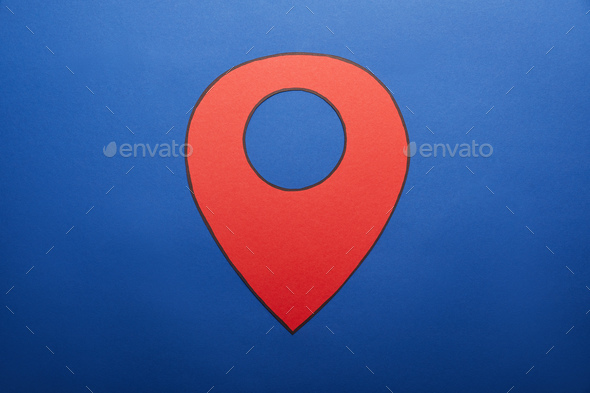 red geolocation drawing on blue background Stock Photo by LightFieldStudios