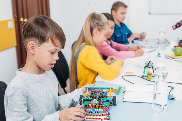 focused children working together on STEM project in classrom Stock ...