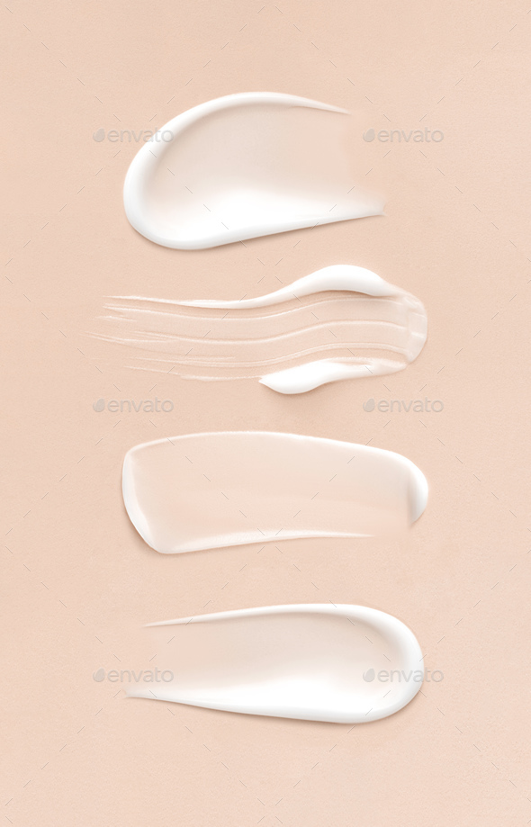 cosmetic smears cream texture on beige background Stock Photo by ...