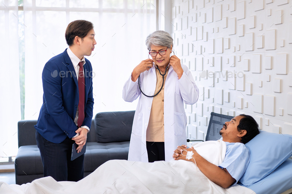 Hospital treatment room relative visit patient lay on bed doctor ...