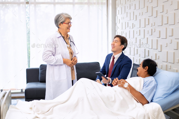 Hospital treatment room relative visit patient lay on bed doctor ...